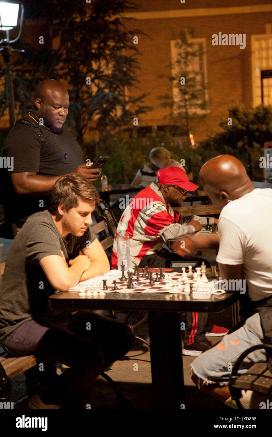 Playing Chess at Night in Washington Square - New York - USA Stock ...