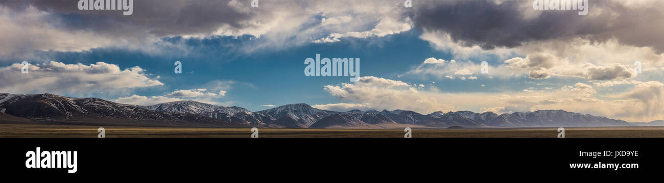 panoramic view of beautiful plain at root of mountains at summer day ...