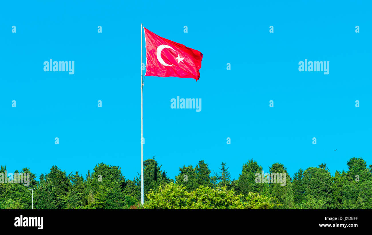 flag of Turkey on blue sky. Turkish flag Stock Photo - Alamy