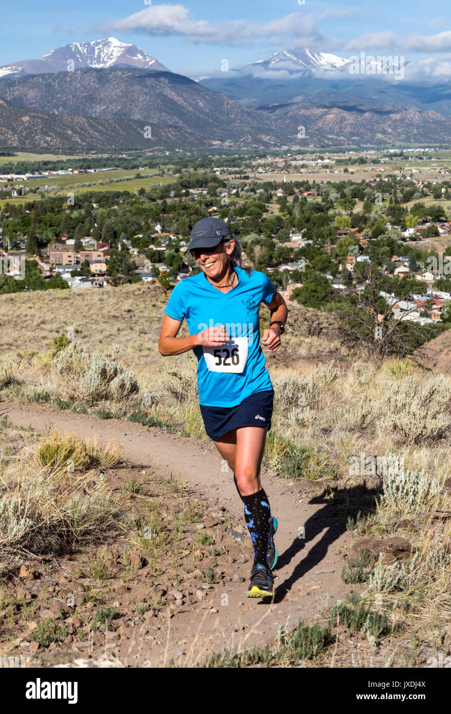 Female runners compete in the Fibark Festival trail run; Salida ...