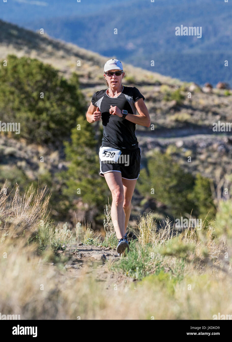 Female runners compete in the Fibark Festival trail run; Salida ...