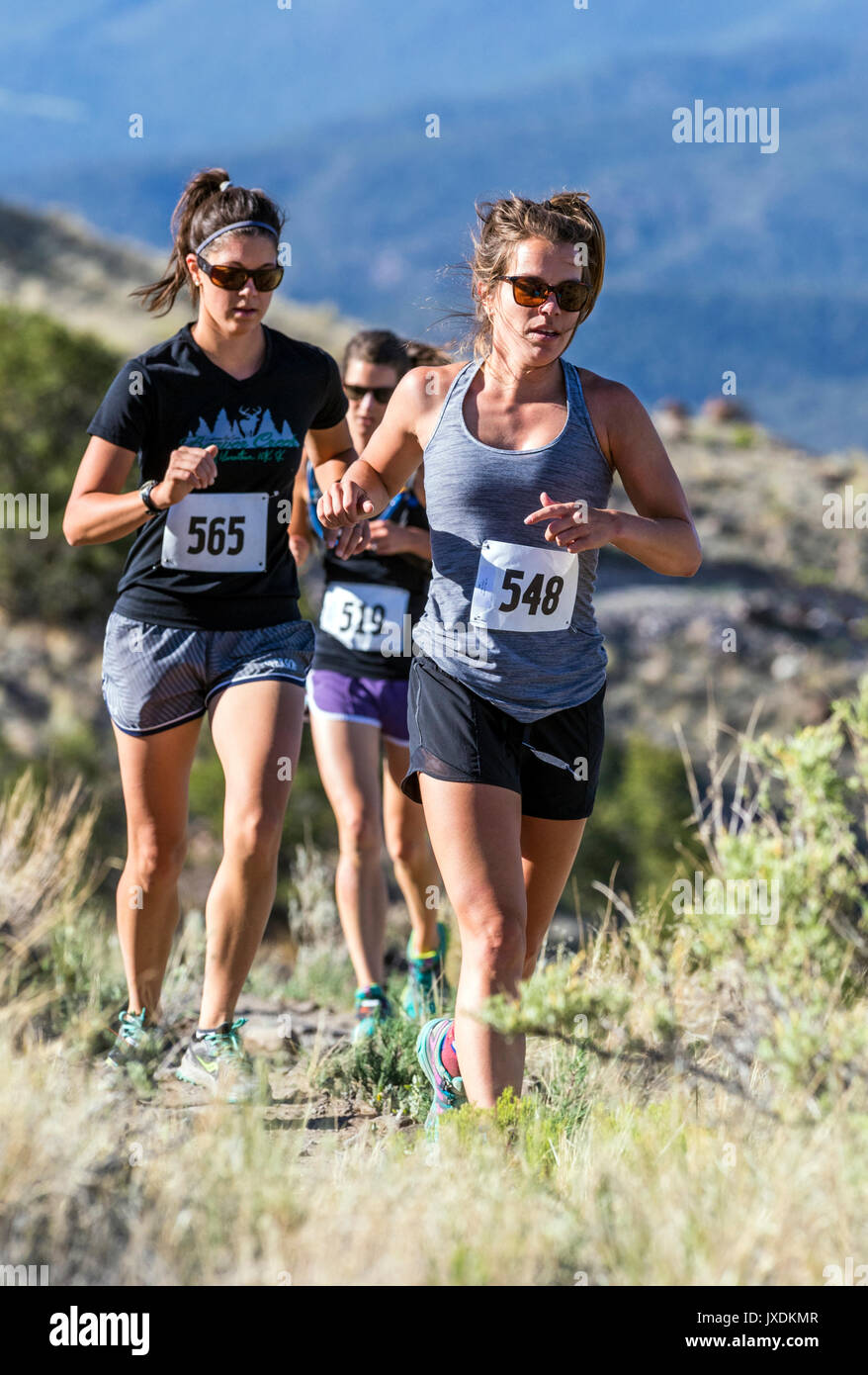 Female runners compete in the Fibark Festival trail run; Salida ...