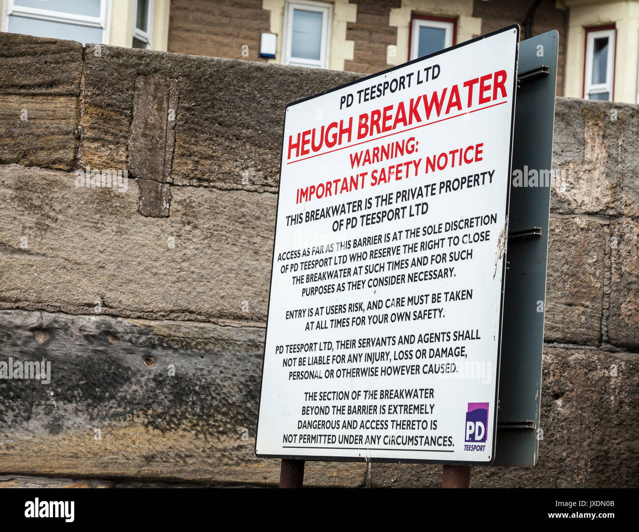 Warning sign at Heugh Breakwater, Hartlepool, England, UK Stock Photo ...