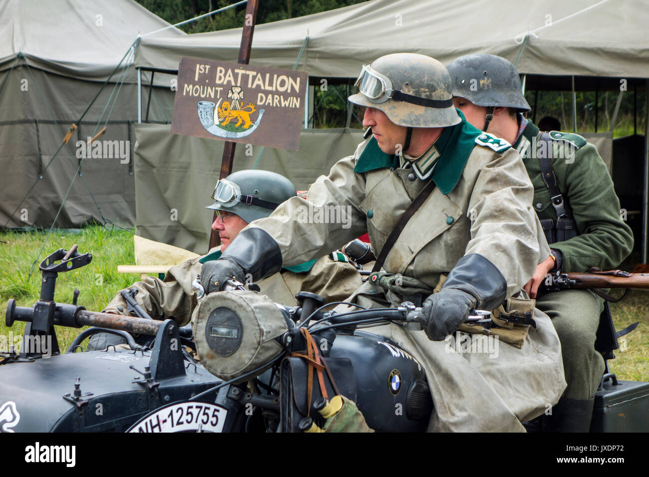 Re-enactors in German WW2 soldier outfits on BMW military motorcycle ...