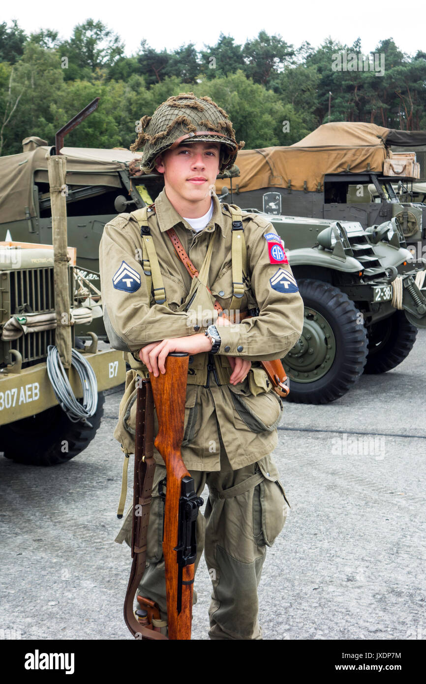 Young re-enactor posing in WW2 US Airborne uniform with Stock Photo ...