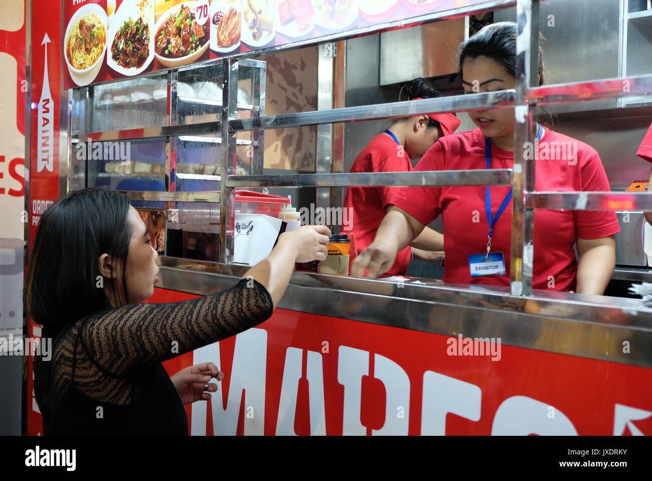 Customer ordering food from a food truck Stock Photo - Alamy