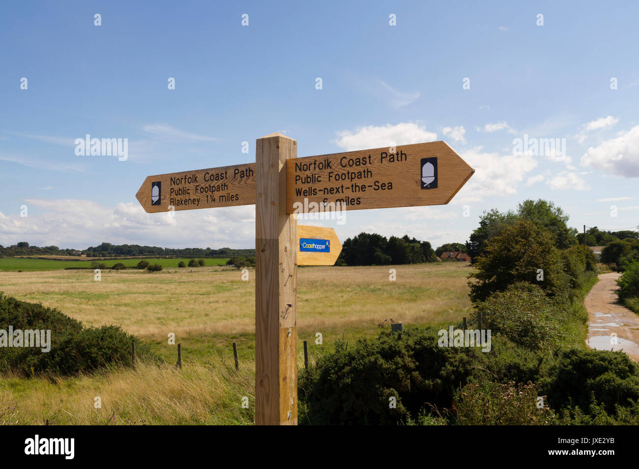 A Norfolk Coast Path finger post footpath sign Stock Photo - Alamy