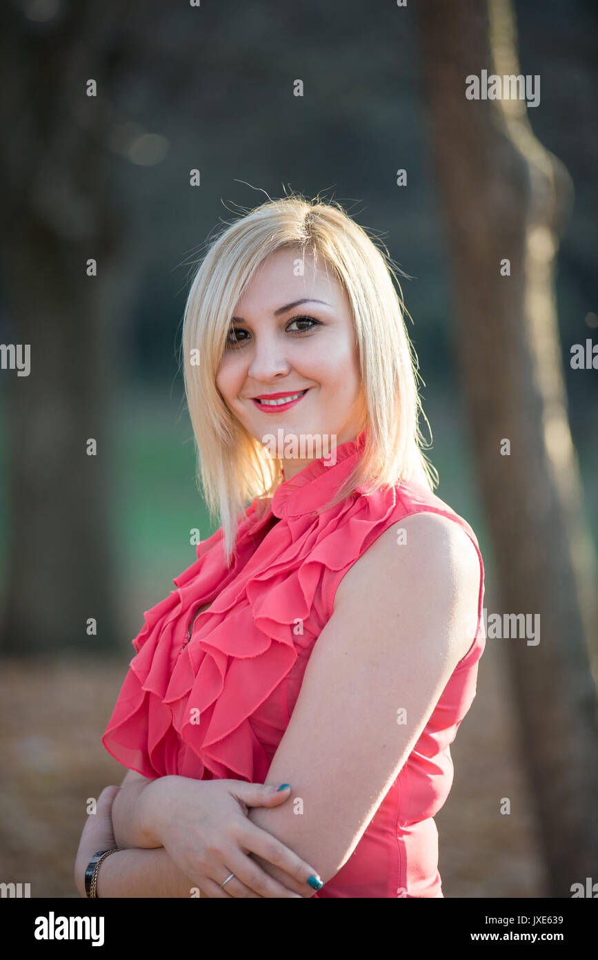 Young cute girl on walk in park Stock Photo - Alamy