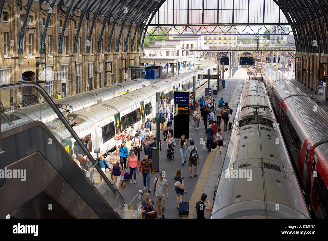 Passengers getting off a train at London Kings Cross railway station ...