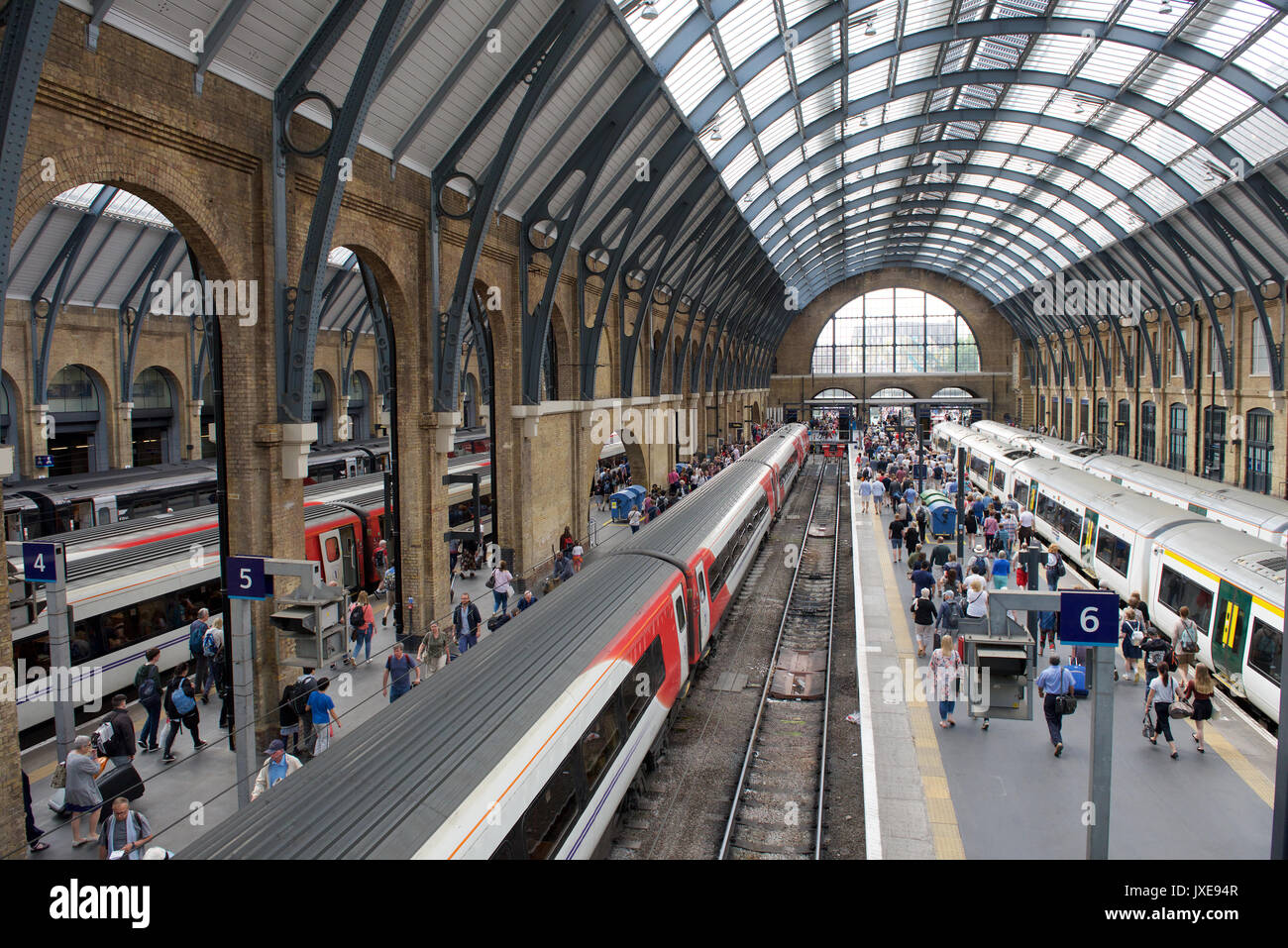 Passengers getting off a train at London Kings Cross railway station ...