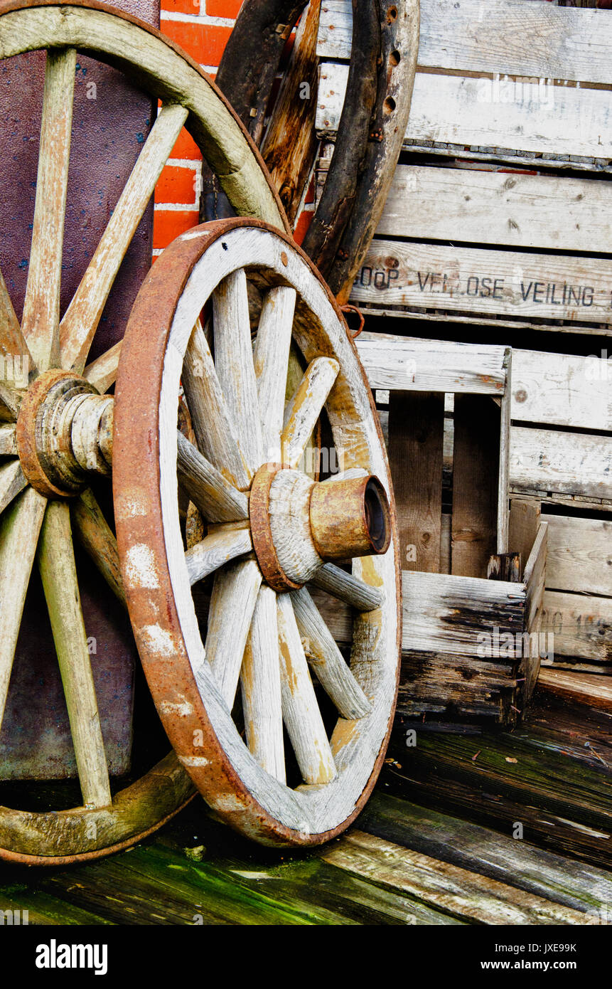Vintage and retro - Farm objects - Two wagon wheels Stock Photo - Alamy