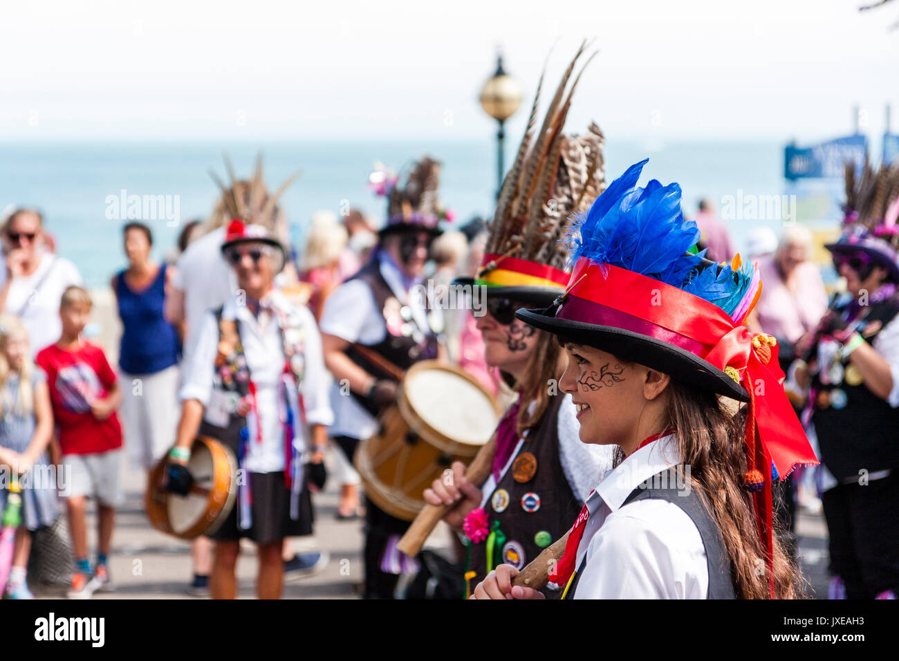 Early teen teenage girl in traditional Morris dancer costume dancing ...