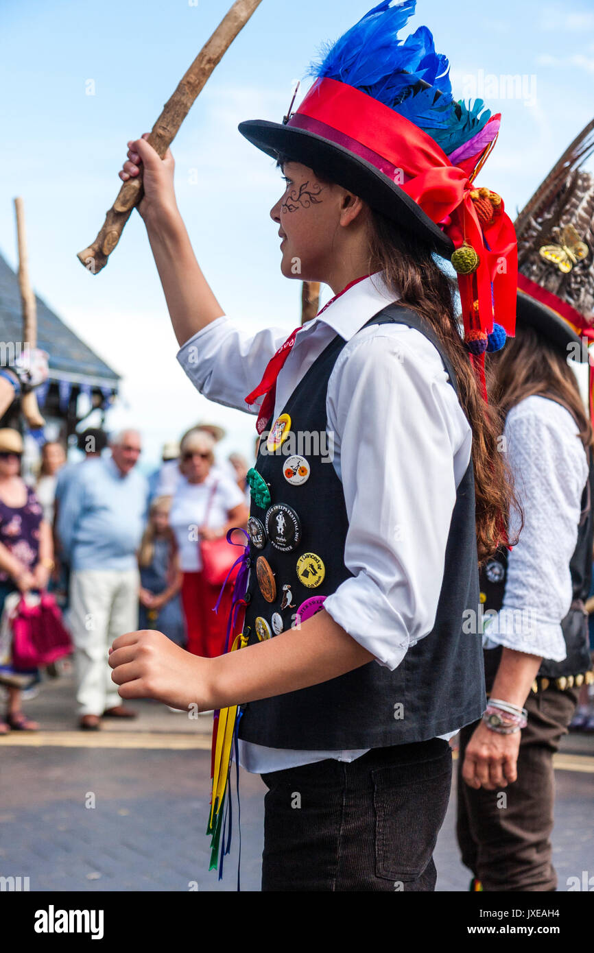 Early teen teenage girl in traditional Morris dancer costume dancing ...