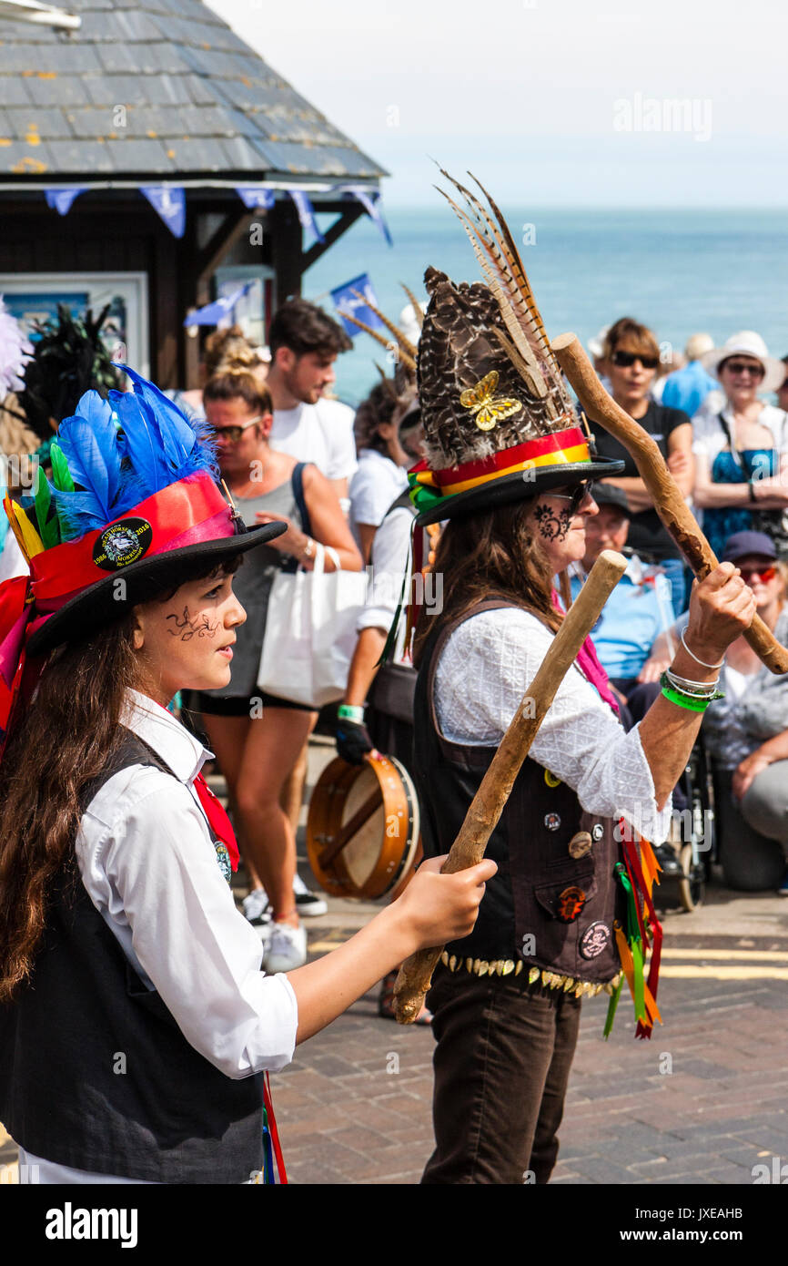Early teen teenage girl in traditional Morris dancer costume dancing ...