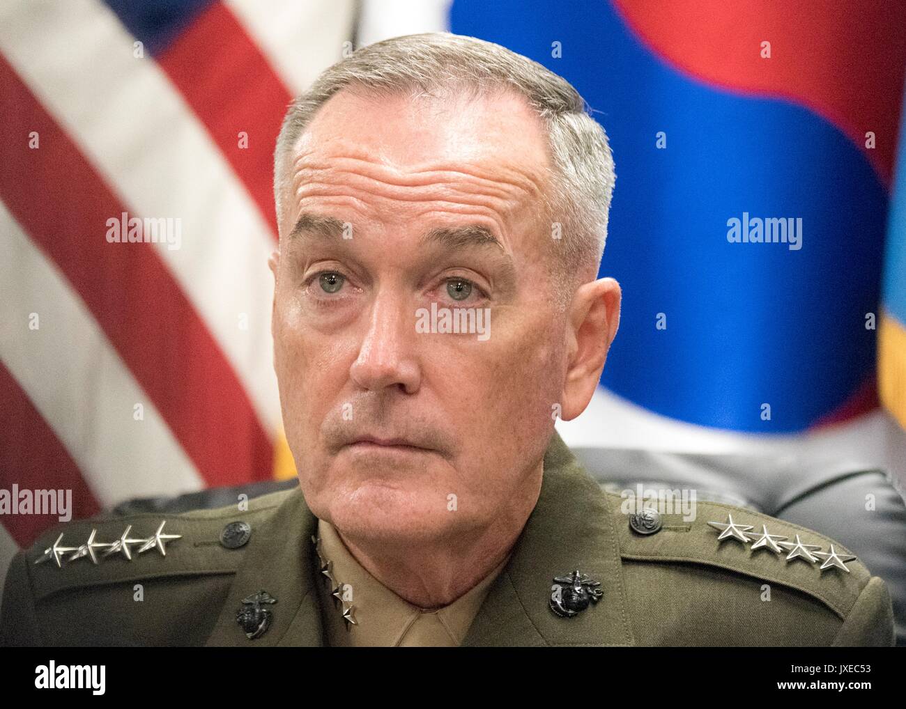 U.S. Chairman of the Joint Chiefs Gen. Joseph Dunford, left, listens to ...