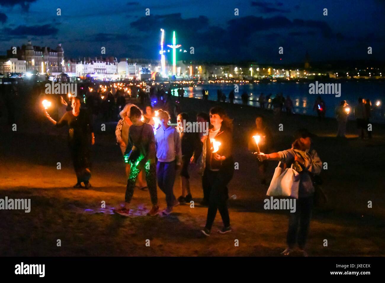 Weymouth, Dorset, UK. 15th August 2017. UK Weather. Hundreds of people ...