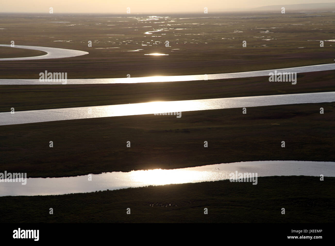 Xinjiang, China. 15th Aug, 2017. Xinjiang, Winding river across the ...