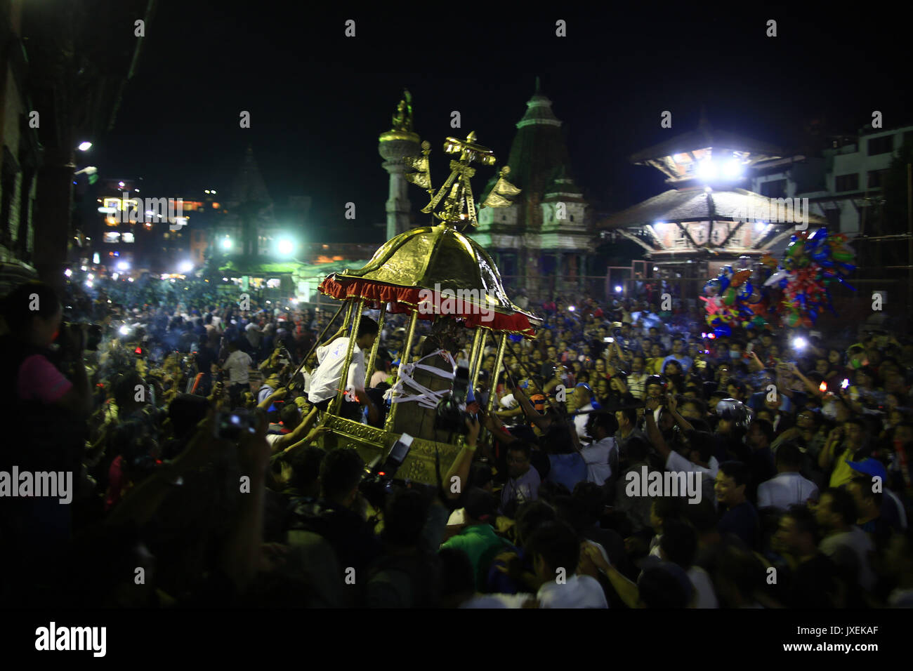 Lalitpur, Nepal. 16th Aug, 2017. Devotees carry a chariot of Lord ...