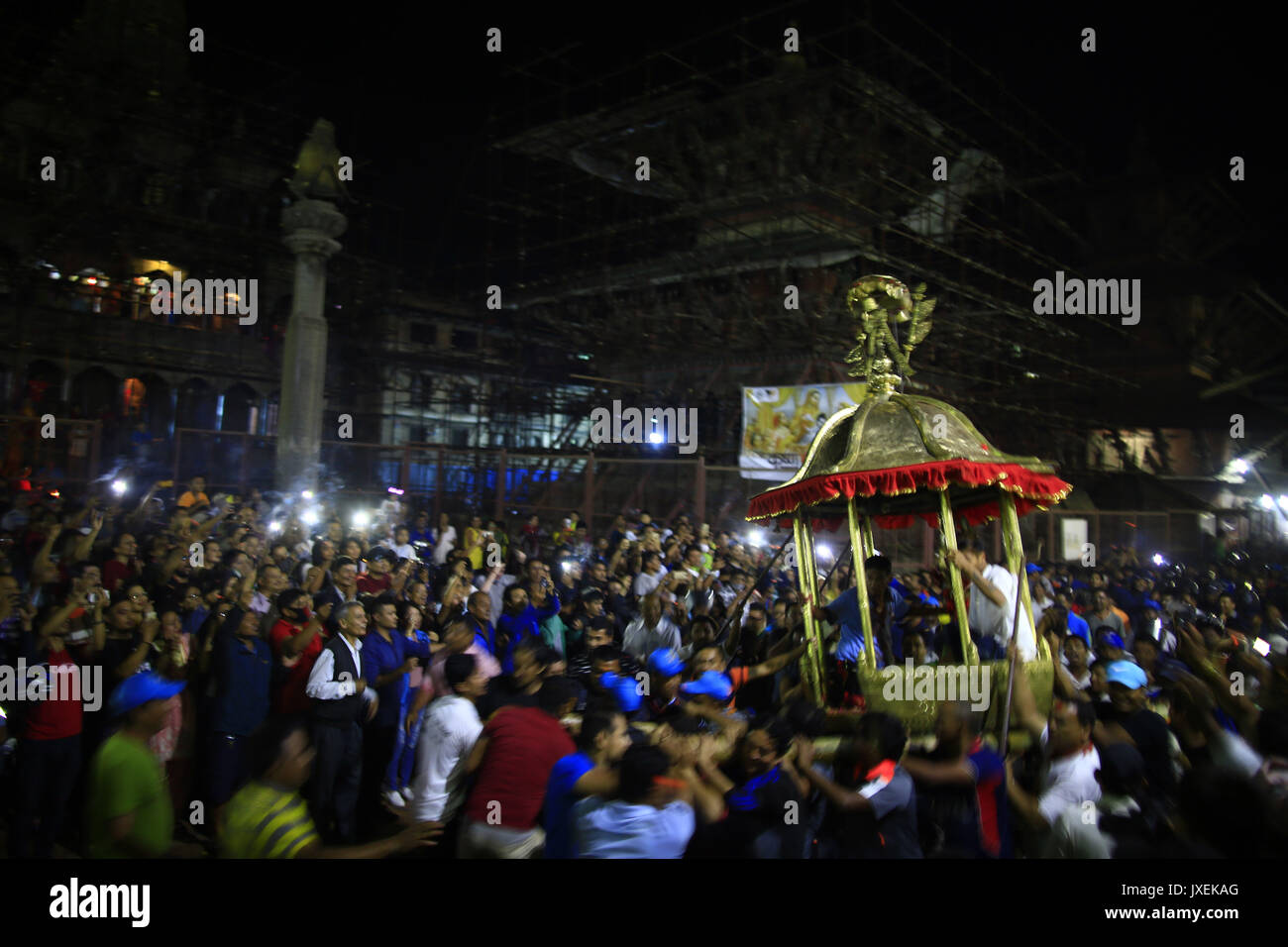 Lalitpur, Nepal. 16th Aug, 2017. Devotees carry a chariot of Lord ...