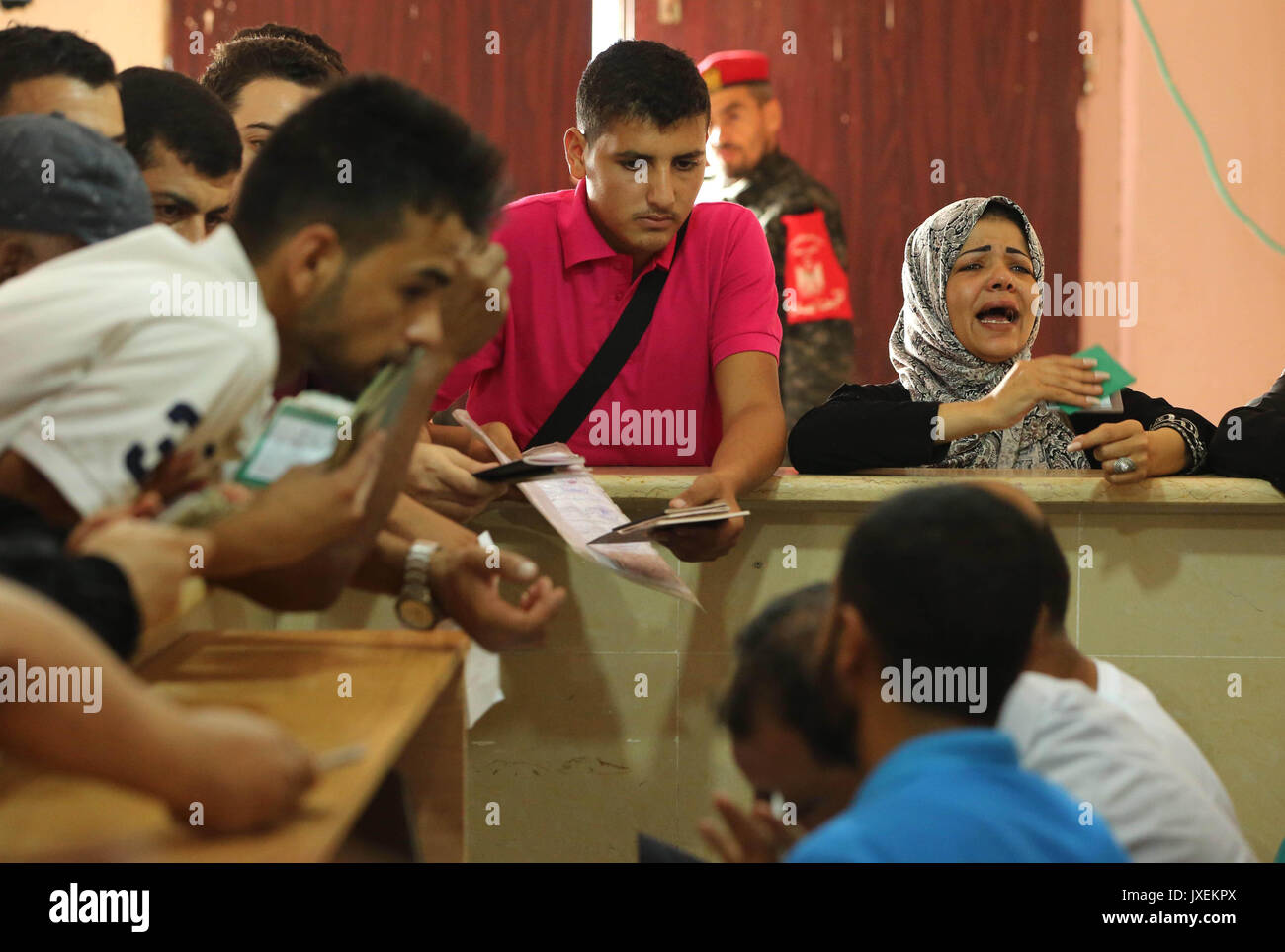 Gaza City, Gaza Strip. 16th Aug, 2017. Palestinians wait for travel ...