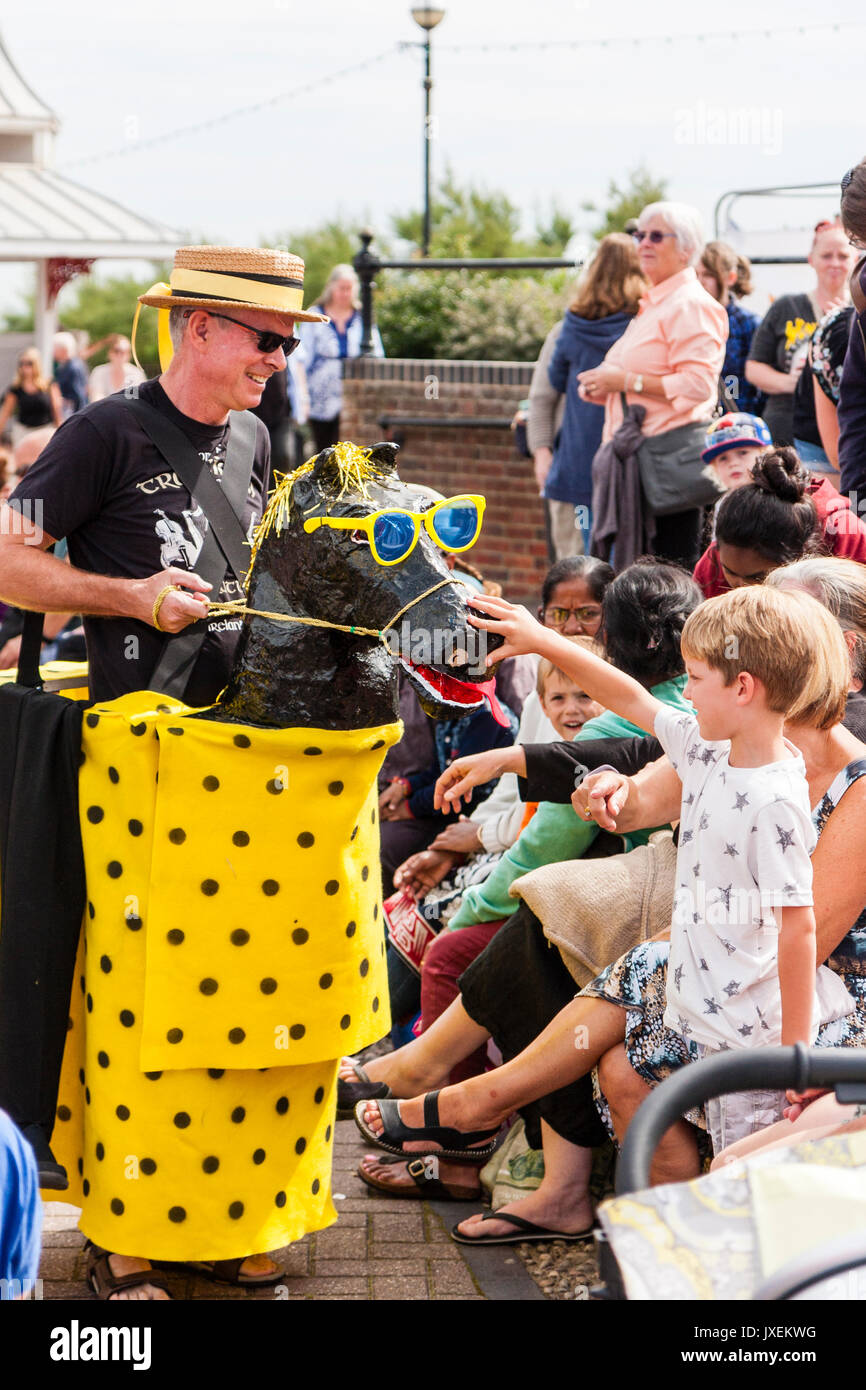 England, Broadstairs folk week. Harwich Morris beast, a horse moving ...