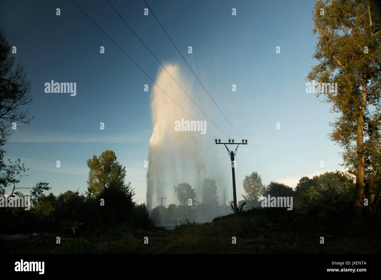 Bursting water from water pipe Stock Photo - Alamy