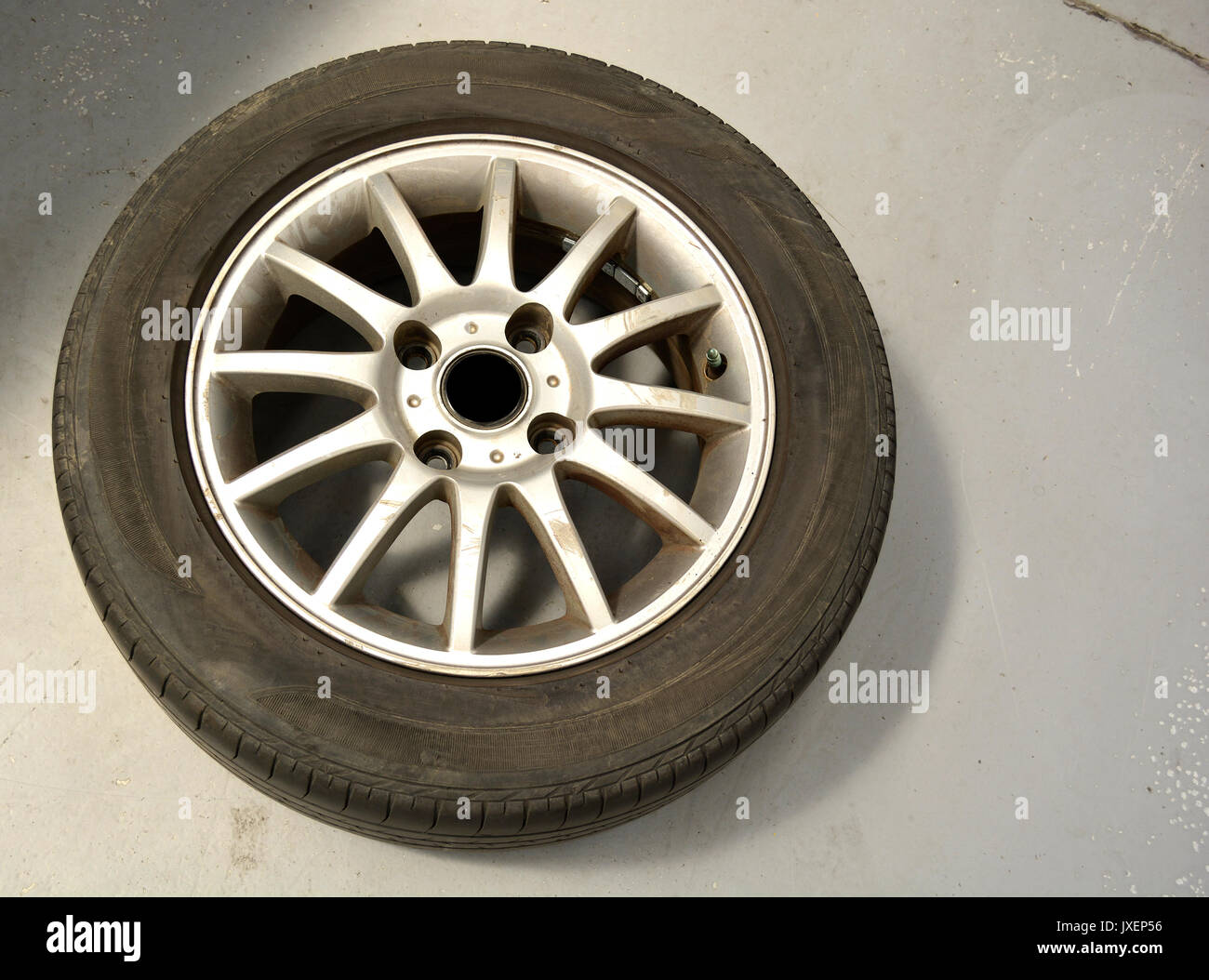 Broken tire damaged on tire surface putting on edge of road Stock Photo ...