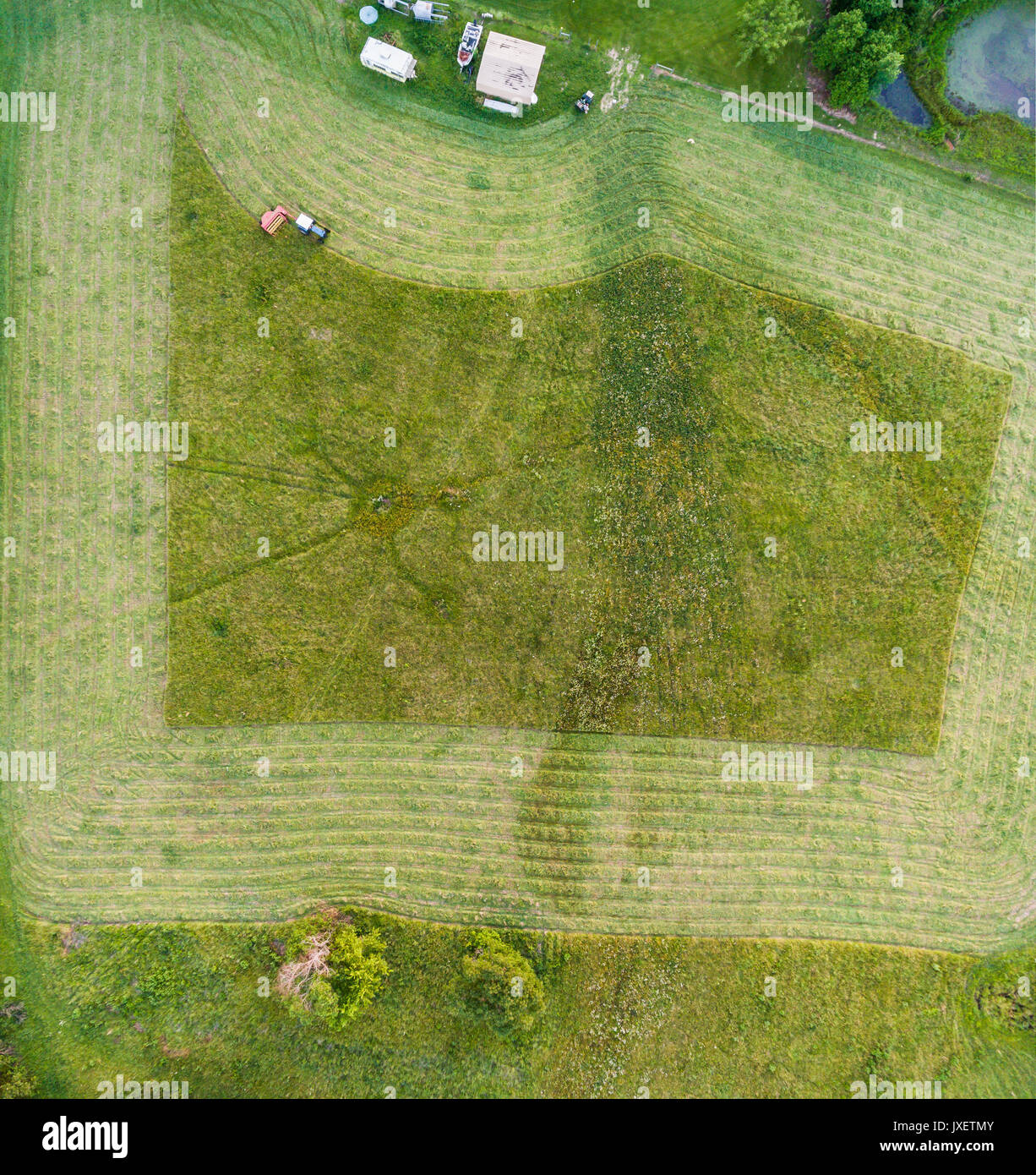 Tractor pulling grass cutter cutting grass hi-res stock photography and ...