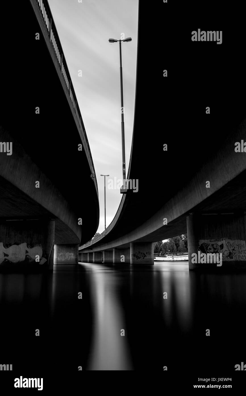 Underneath Bridge in Umea, Sweden with river Stock Photo - Alamy