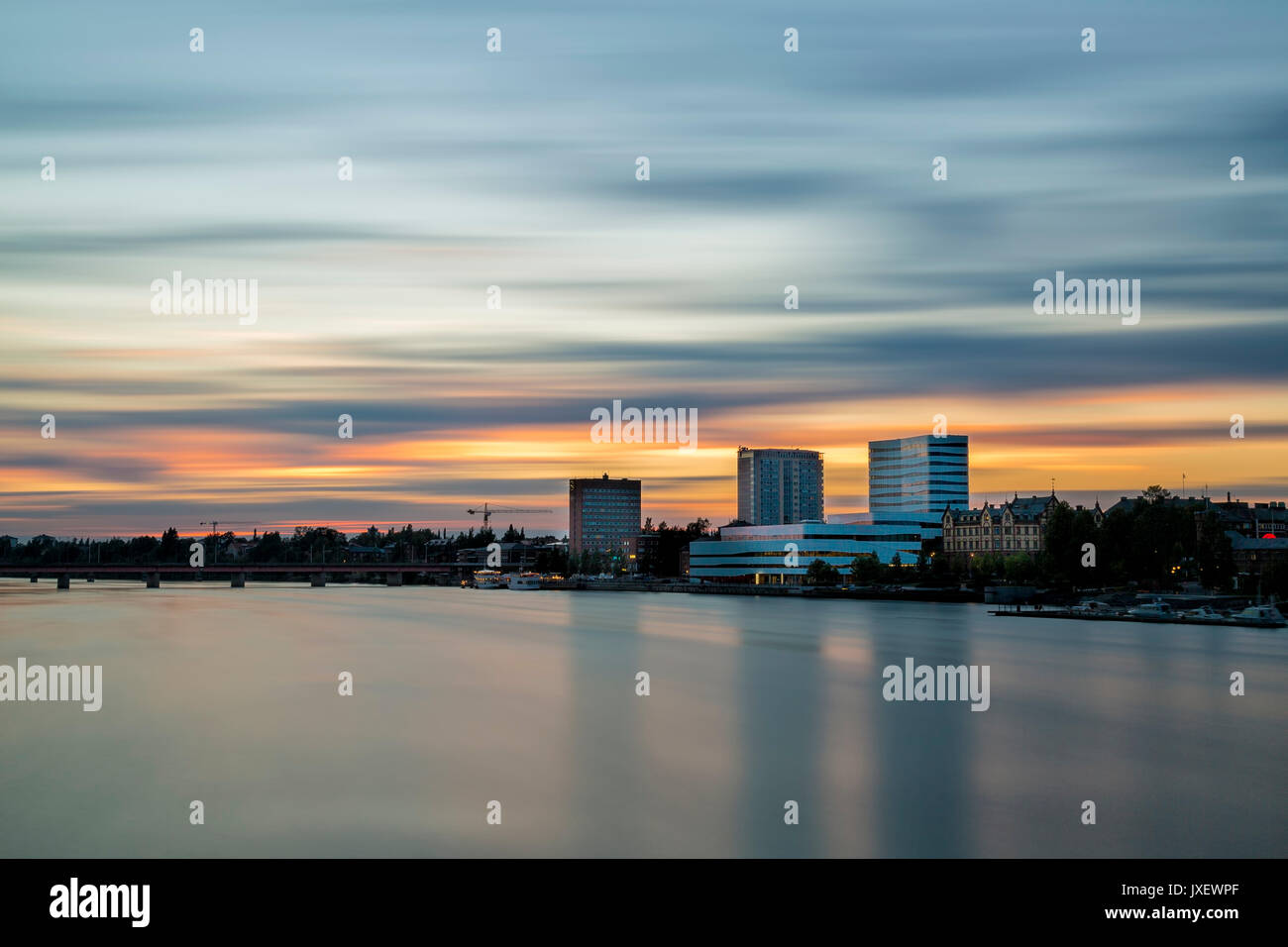 Sunset over Downtown Umea, Sweden and its river Stock Photo - Alamy