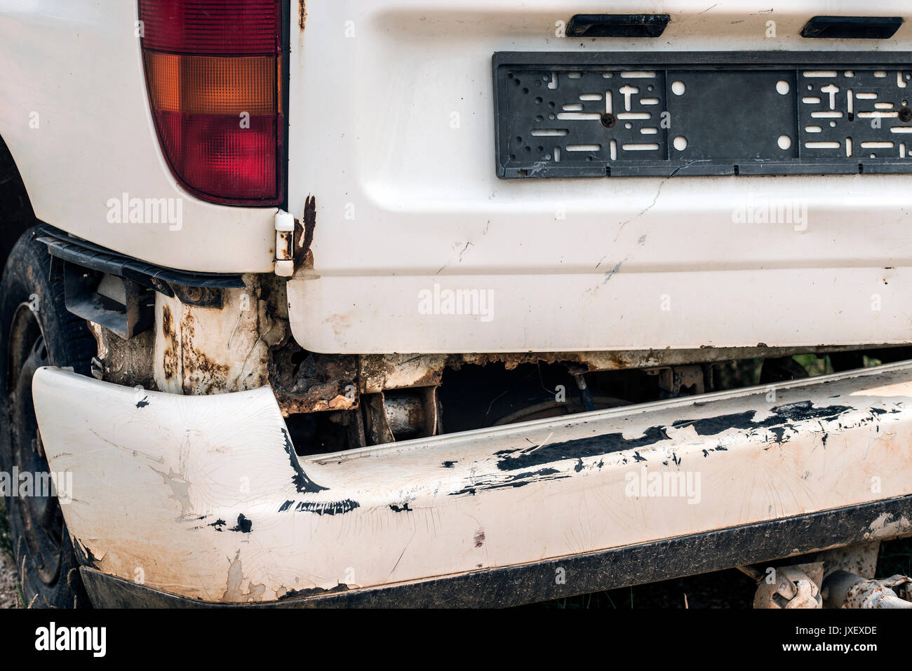 Old rusty and broken car bumper Stock Photo - Alamy