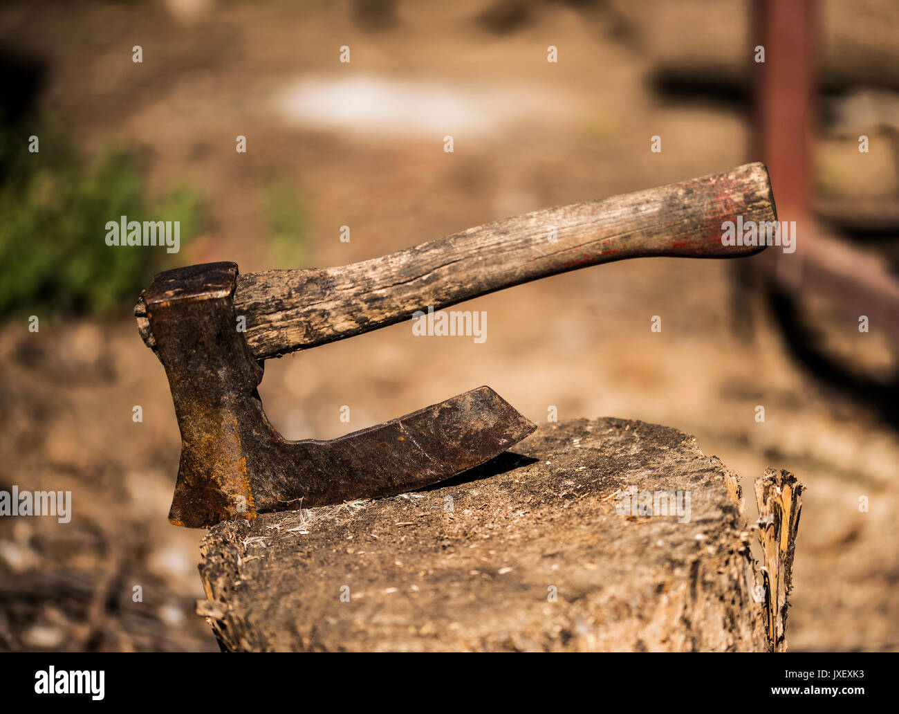 Small wooden axe for killing chickens on a farm Stock Photo - Alamy