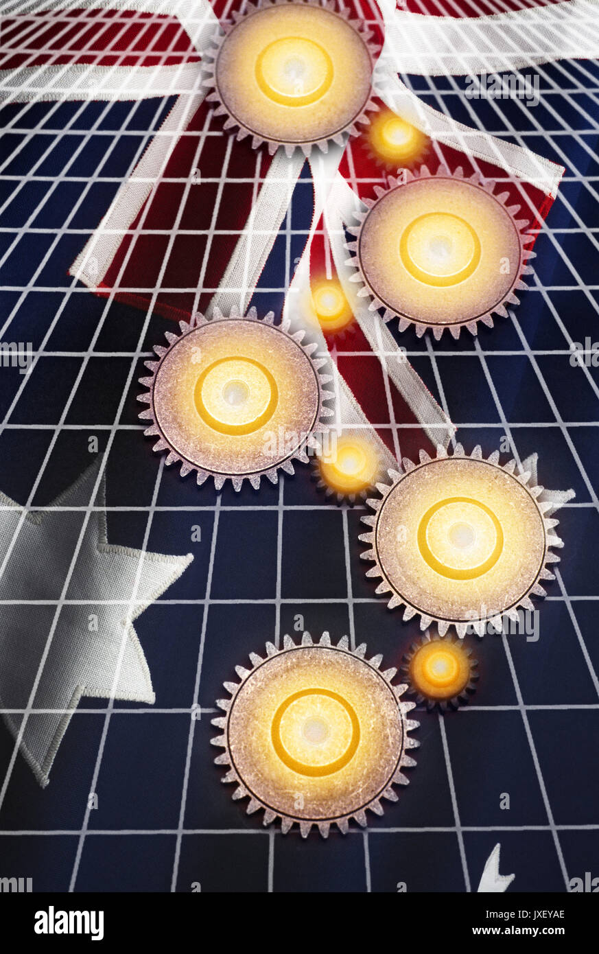 INTERLOCKING COG GEARS ON GRID OVER FLAG OF AUSTRALIA Stock Photo - Alamy