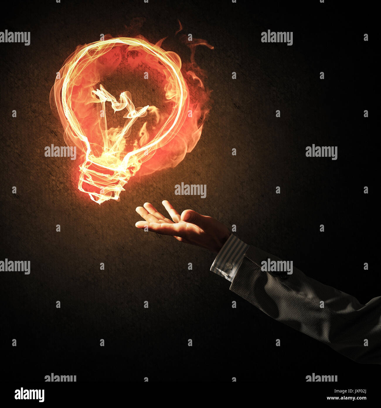 Concept of electricity or inspiration with burning light bulb Stock ...