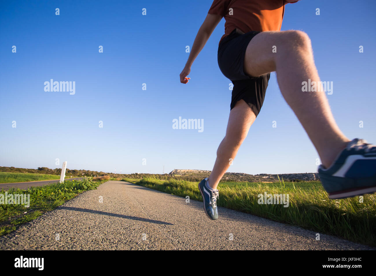Outdoor cross-country running in summer sunshine concept for exercising ...