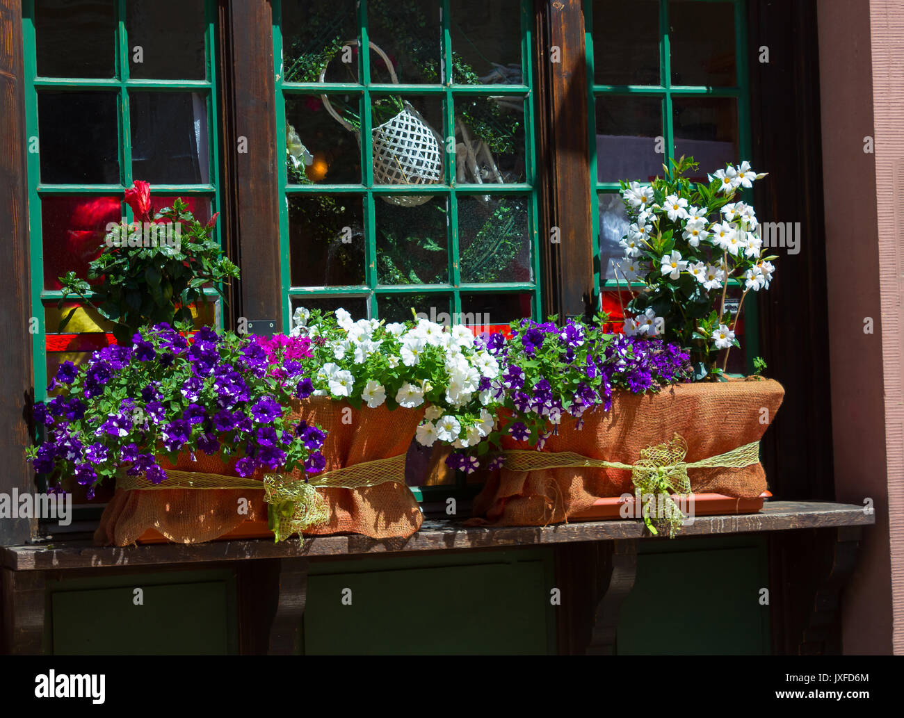 Window decorated with flowers Stock Photo - Alamy