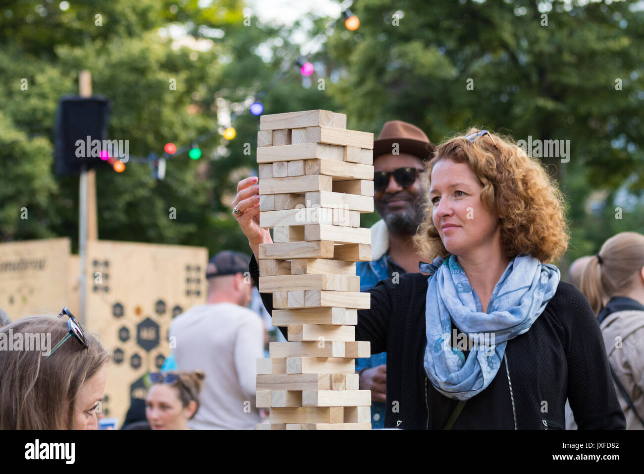 Woman playing Jenga at HOP beer festival 2017 Stock Photo - Alamy