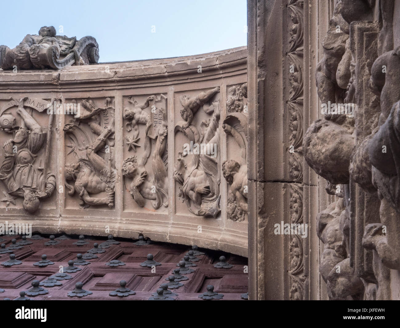Detail of gods in stone at the door entrance of the sacred Chapel ...
