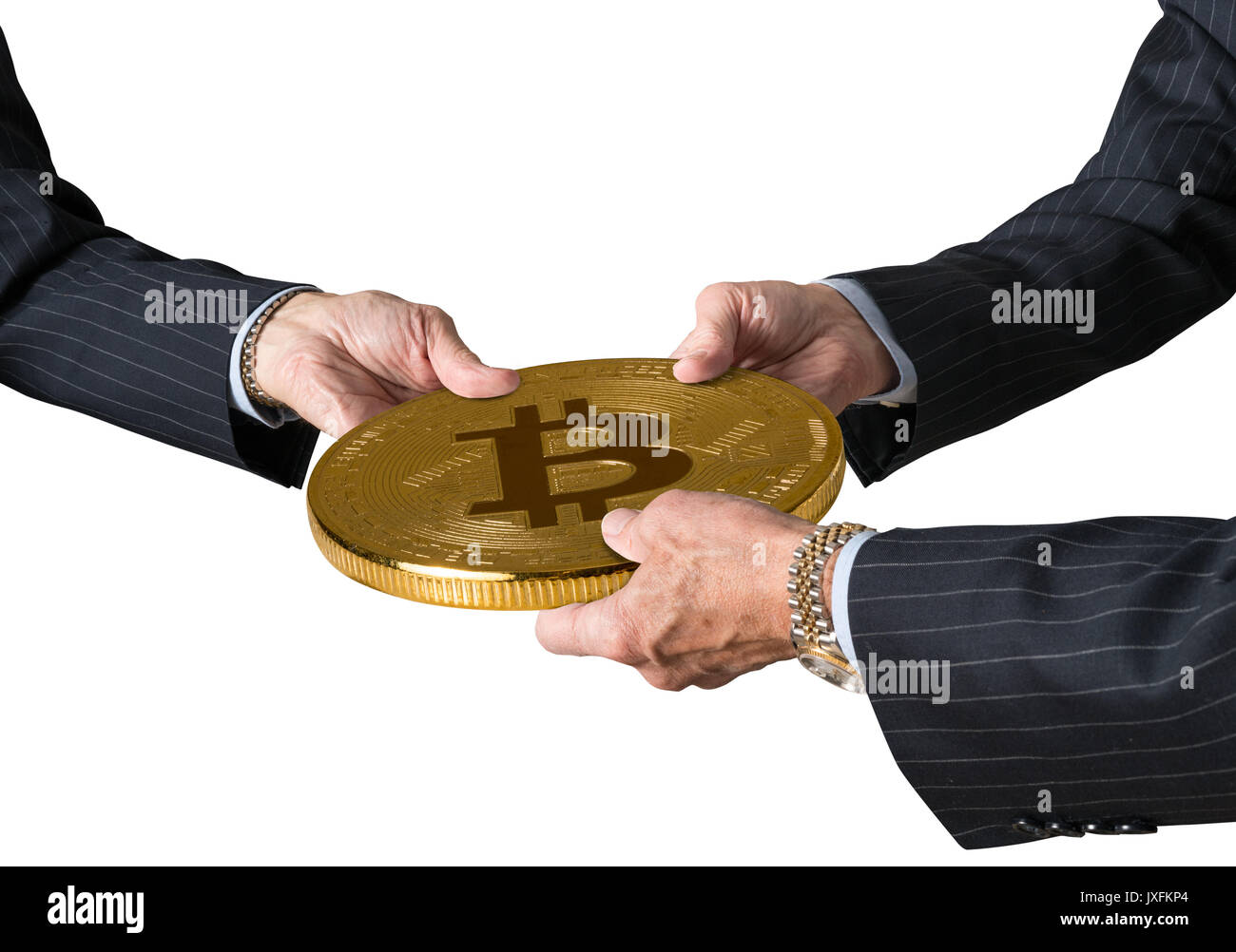 Three traders hands holding large bitcoin Stock Photo - Alamy