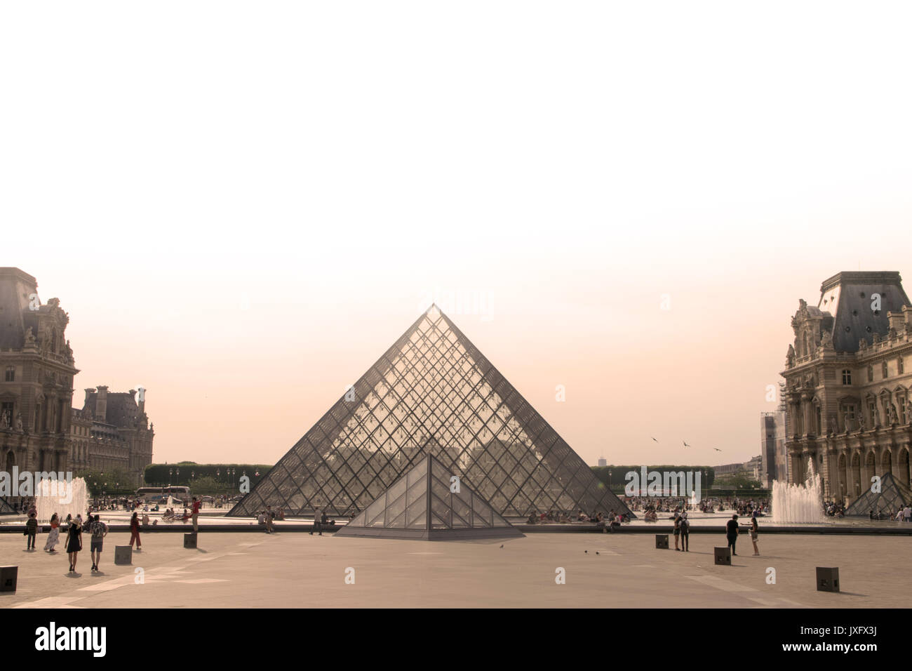 Louvre museum with the famous glass pyramid Stock Photo - Alamy