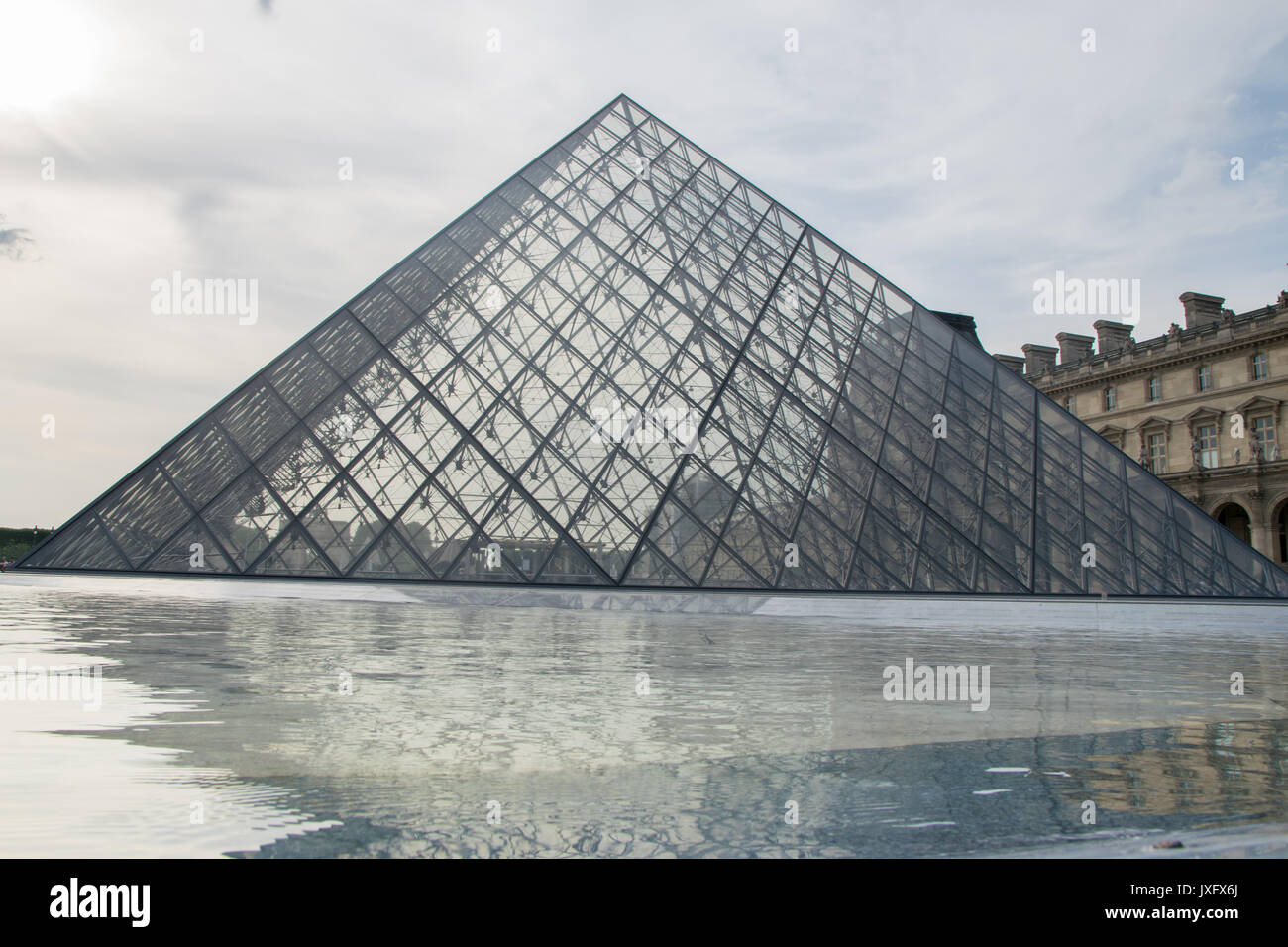 Louvre museum with the famous glass pyramid Stock Photo - Alamy