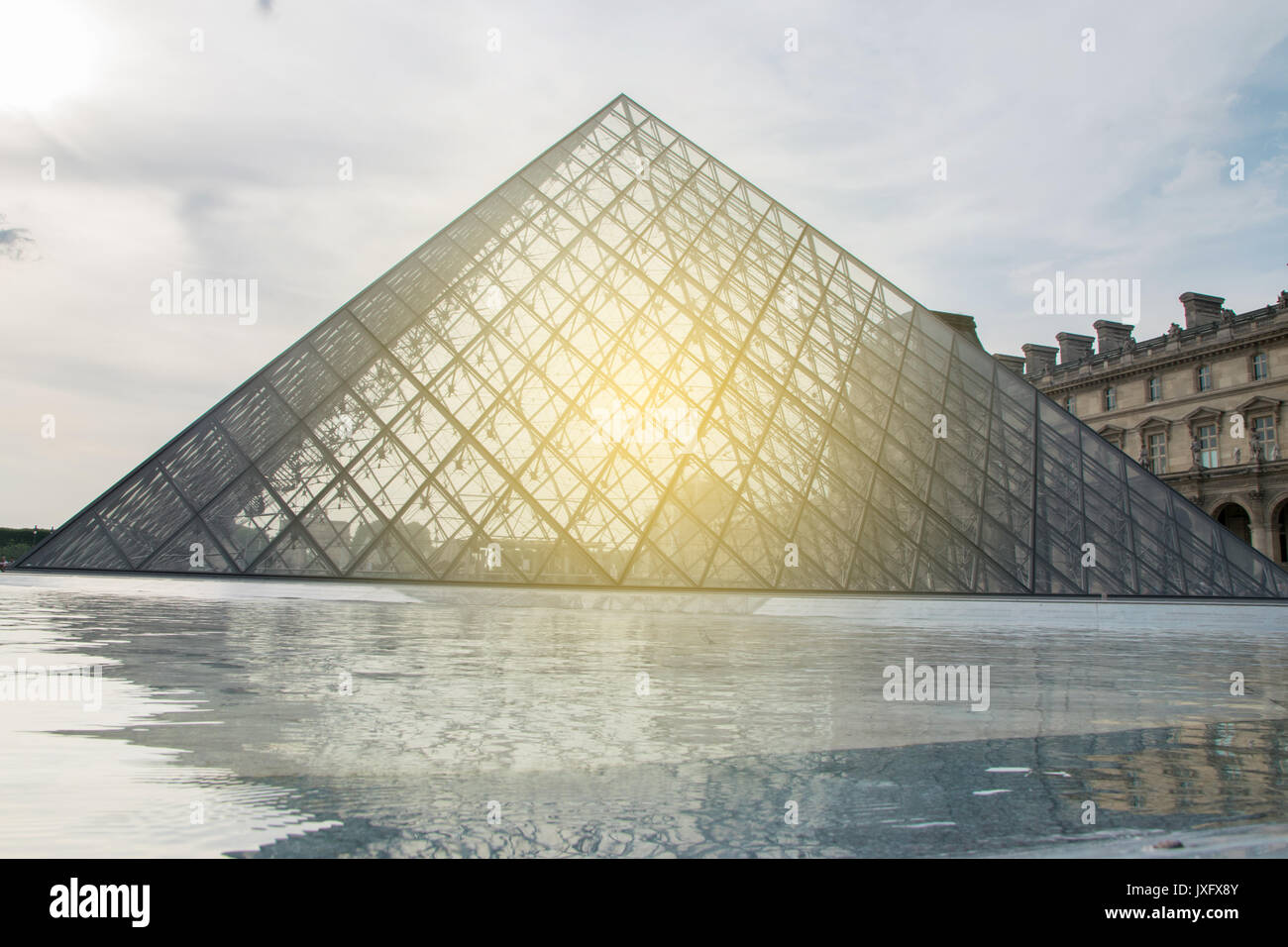 Louvre museum with the famous glass pyramid Stock Photo - Alamy