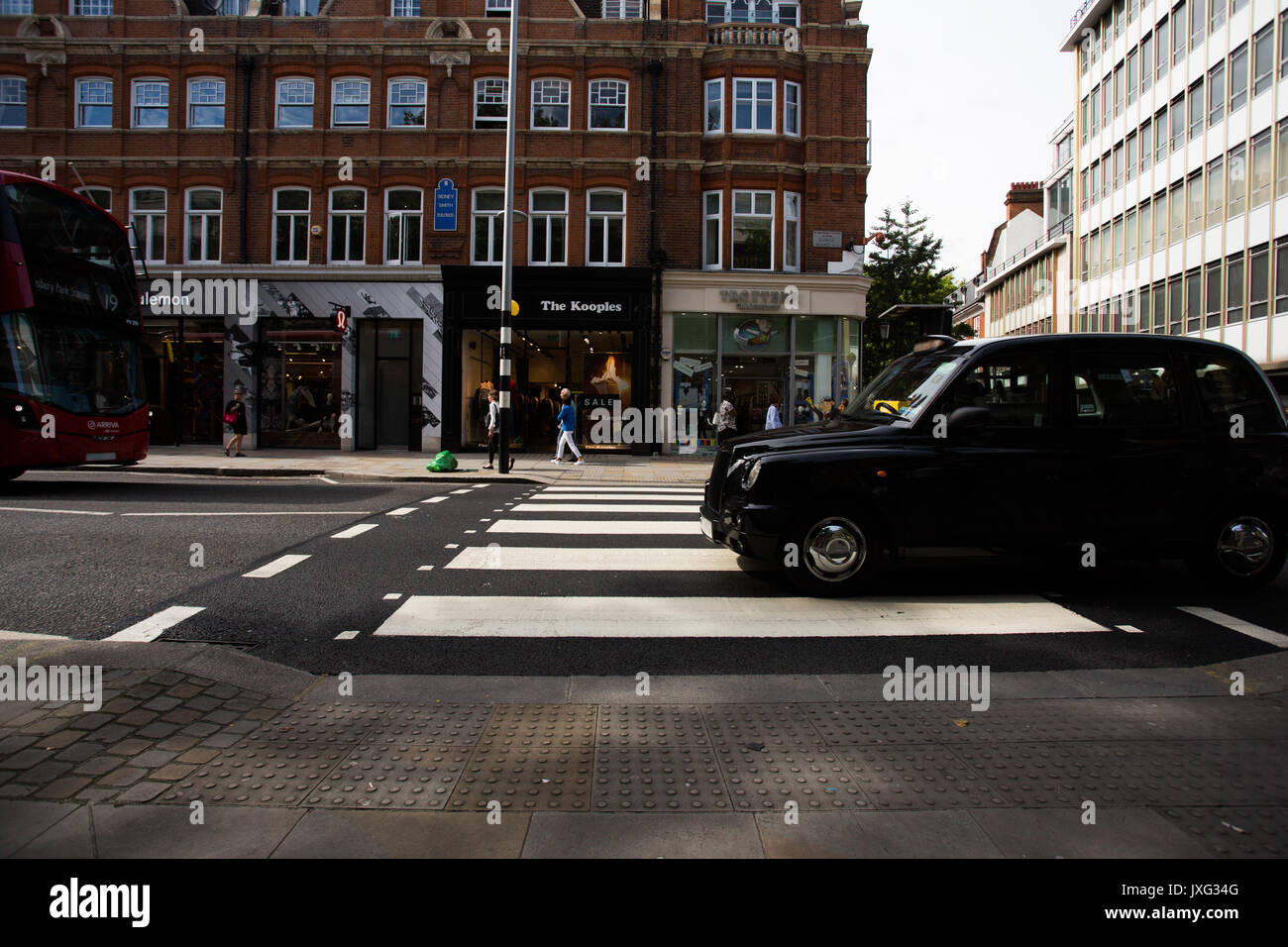 A Zebra Crossing with black London Taxi Cab on Zebra Crossing and ...