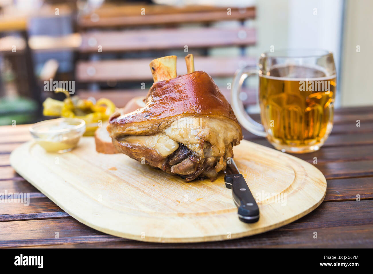 shin, knee wild boar - roast pork leg with vegetables Stock Photo - Alamy