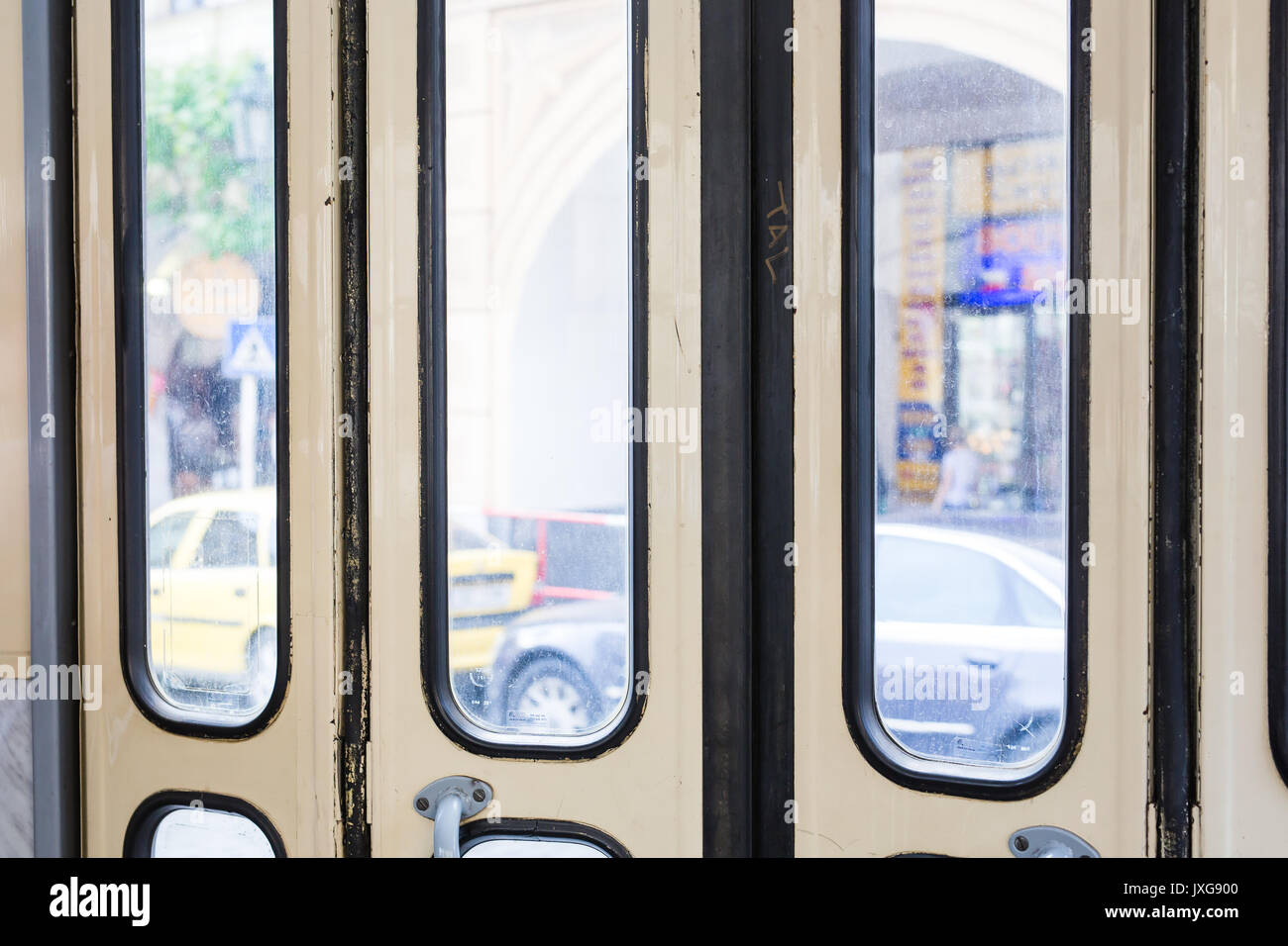 Closed entrance door in tram Stock Photo - Alamy