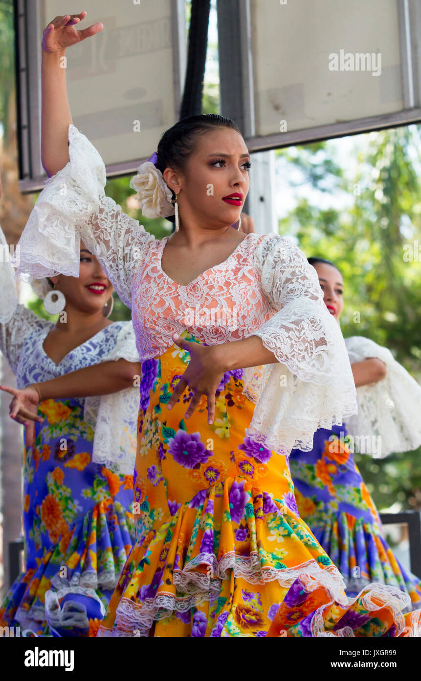 Three Flamenco dancers preforming on an outdoor stage Stock Photo - Alamy