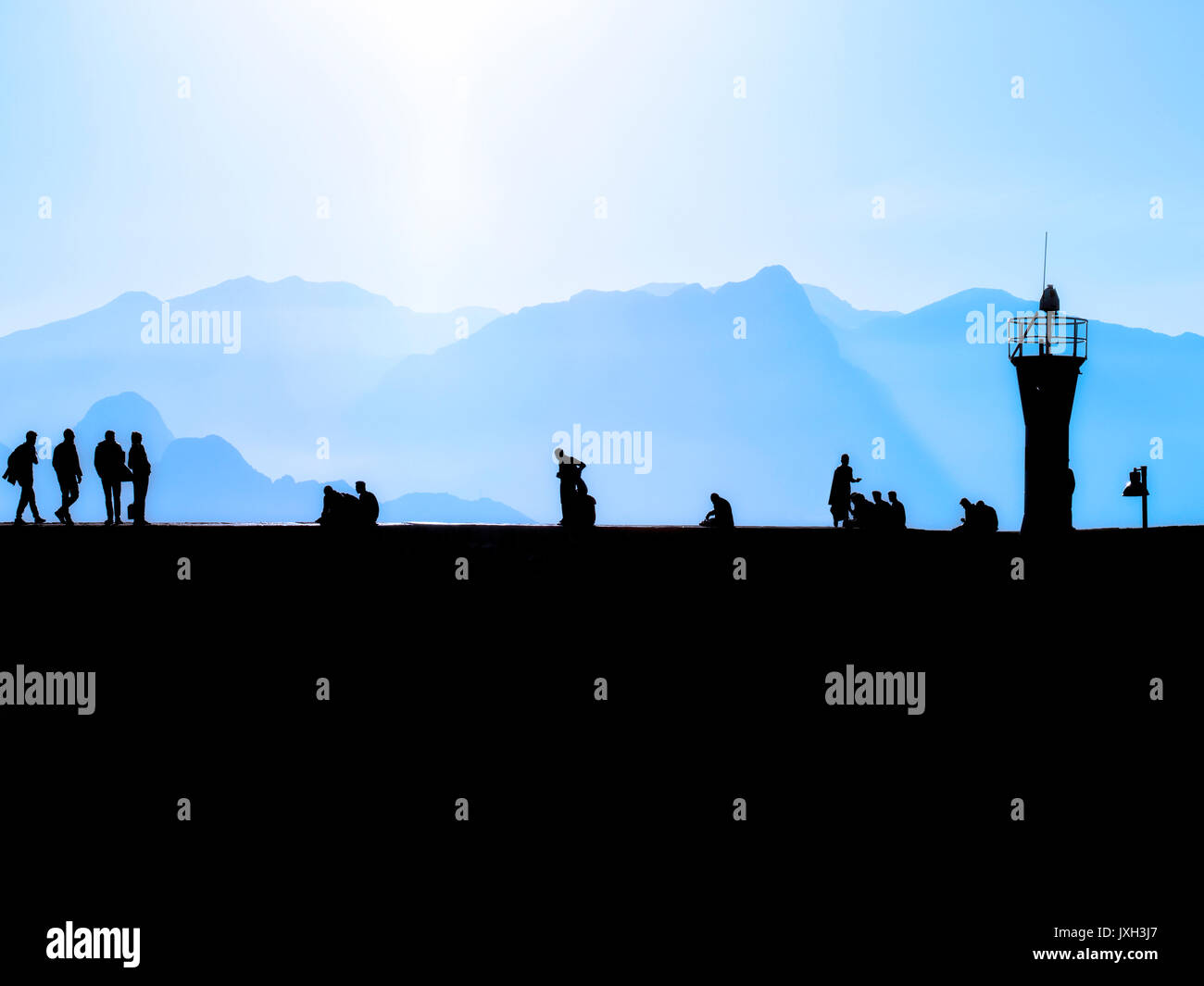 Silhouetted people walking over hi-res stock photography and images - Alamy