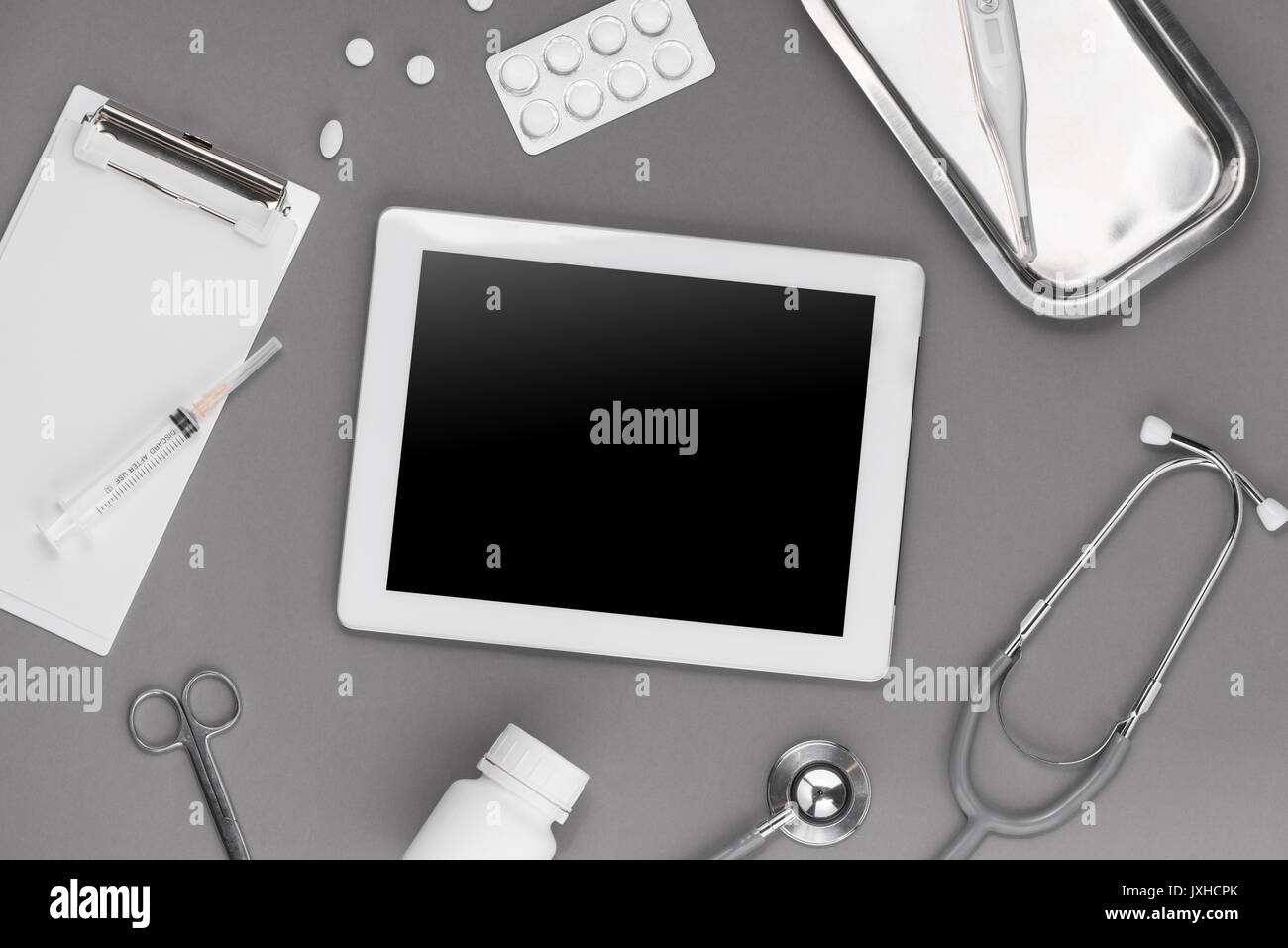 Top view of doctor desk table with stethoscope and medical items. Flat ...