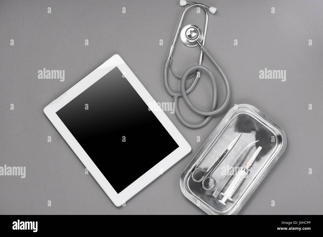 Top view of doctor desk table with stethoscope and medical items. Flat ...