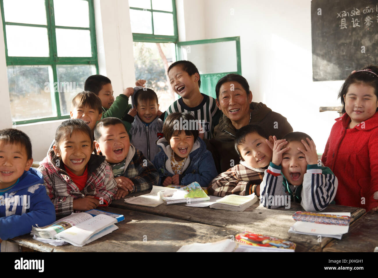 Rural female teachers and pupils in the classroom Stock Photo - Alamy